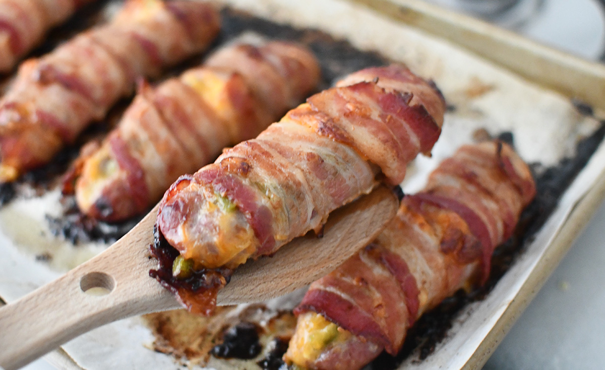 Bacon Wrapped Sausage Stuffed with Cheese and Jalapeños